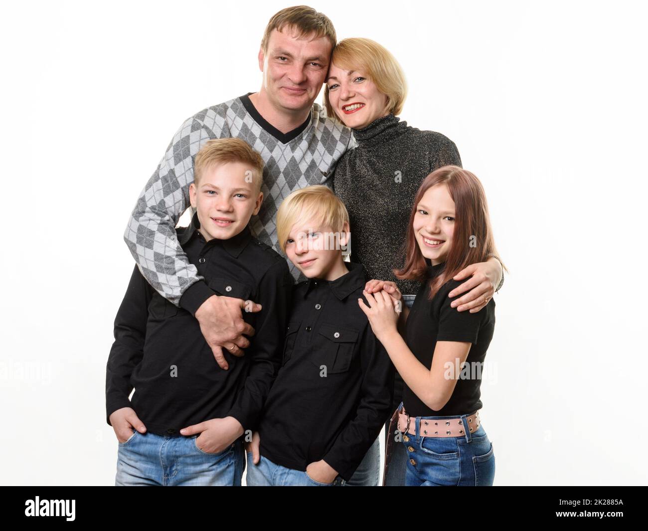 Happy growing up large family, two teenager boys and a girl, isolated ...