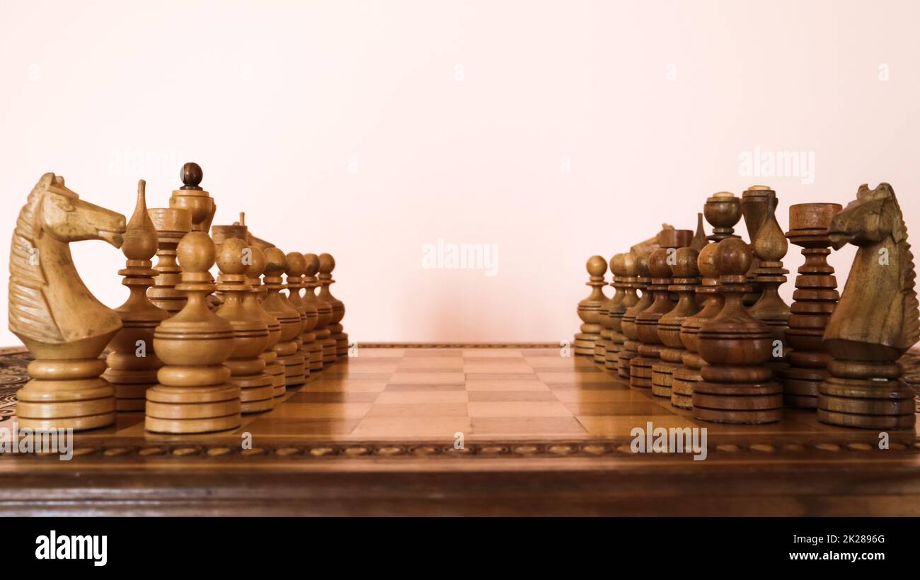 wooden chessboard with wooden brown chess pieces Stock Photo - Alamy