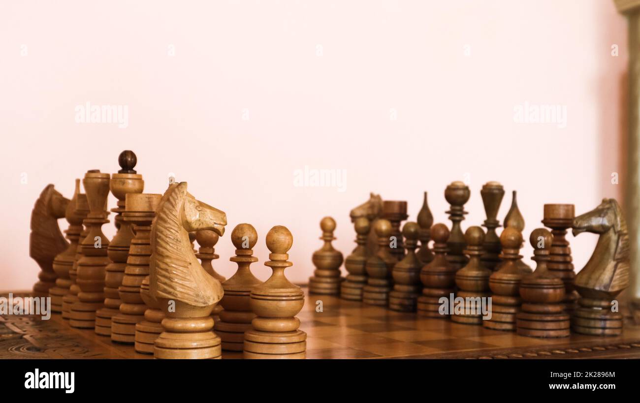 wooden chessboard with wooden brown chess pieces Stock Photo - Alamy