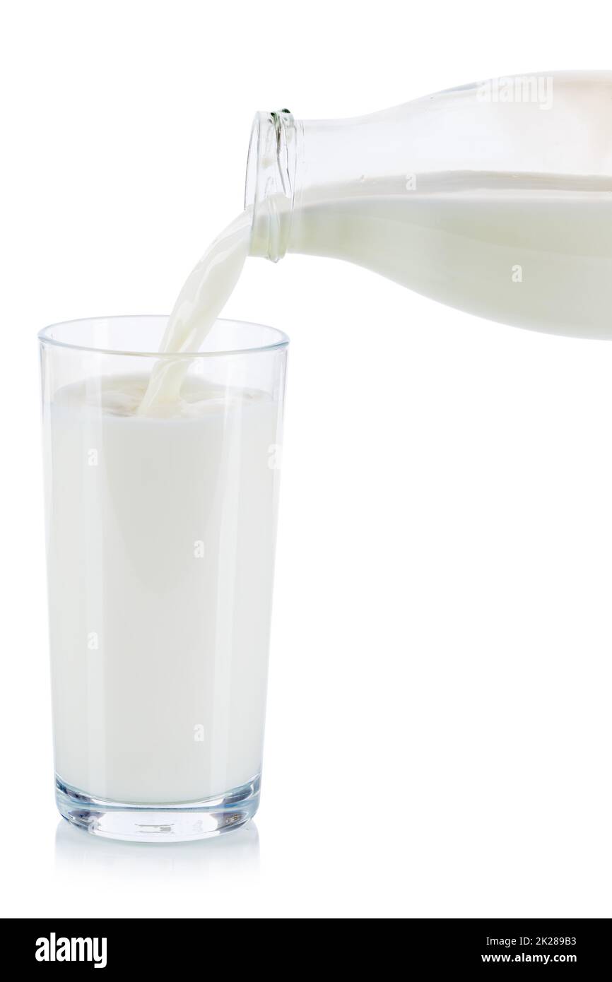 Fresh milk pouring pour glass bottle isolated on white Stock Photo - Alamy