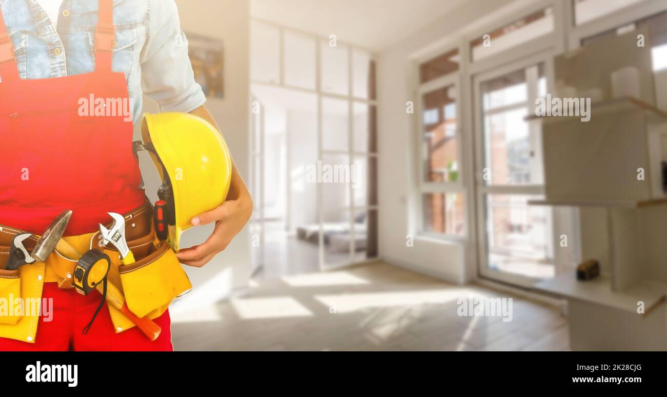 Builder handyman with construction tools. House renovation background ...