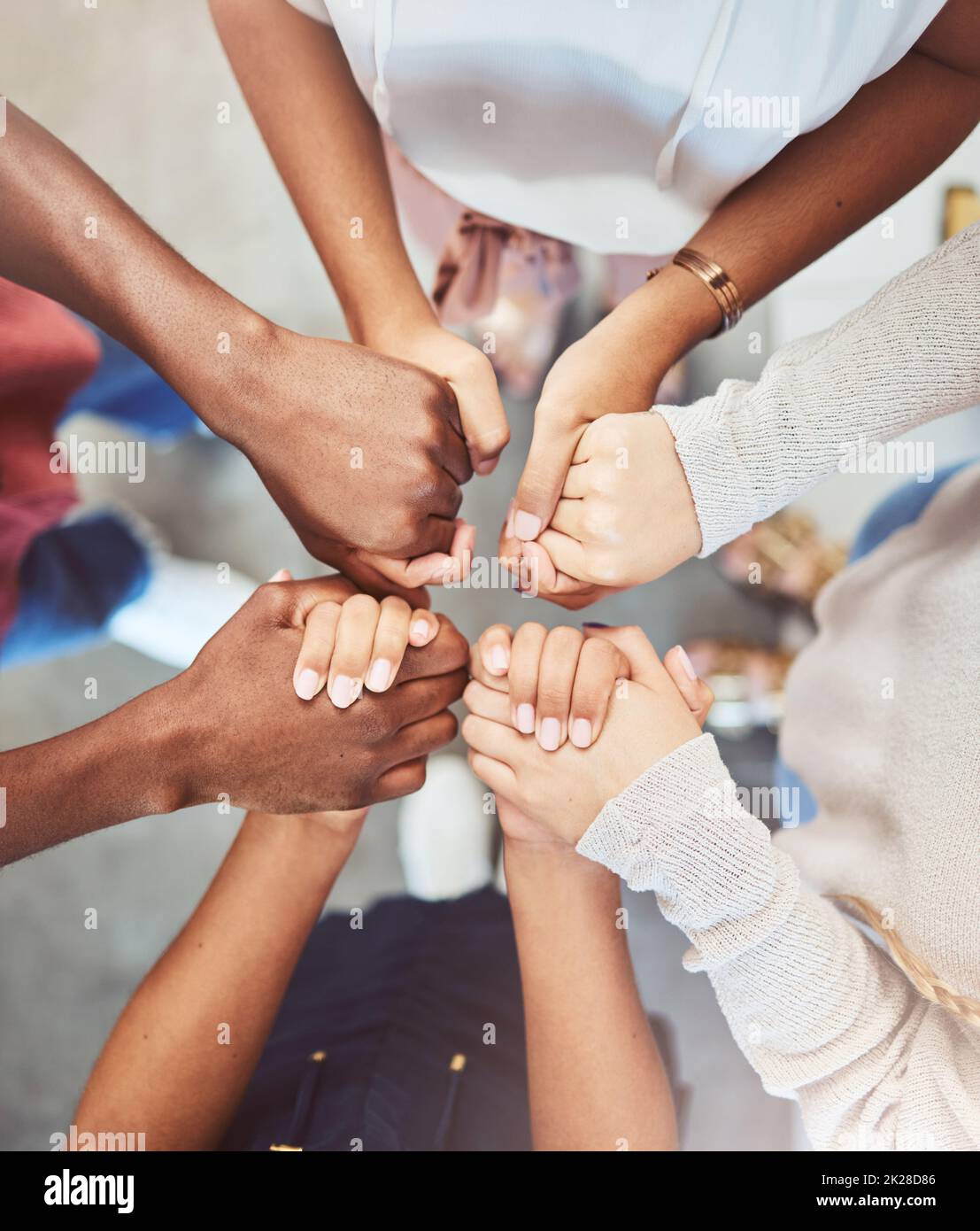 Support, prayer and trust with people holding hands in counseling for ...