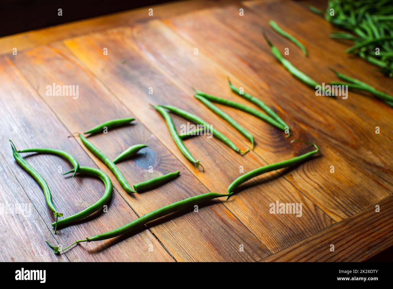 Person picking beans from plant hi-res stock photography and images - Alamy