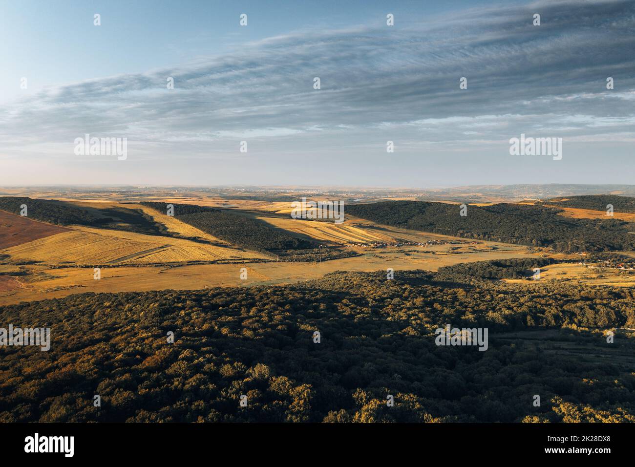 Aerial view of endless lush pastures farmlands & forests of Europe ...