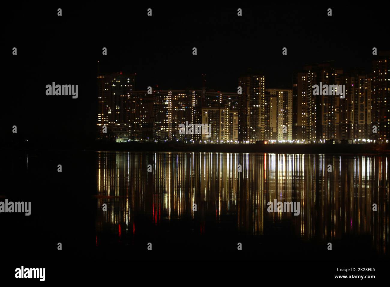night cityscape light in the windows of skyscrapers Stock Photo - Alamy