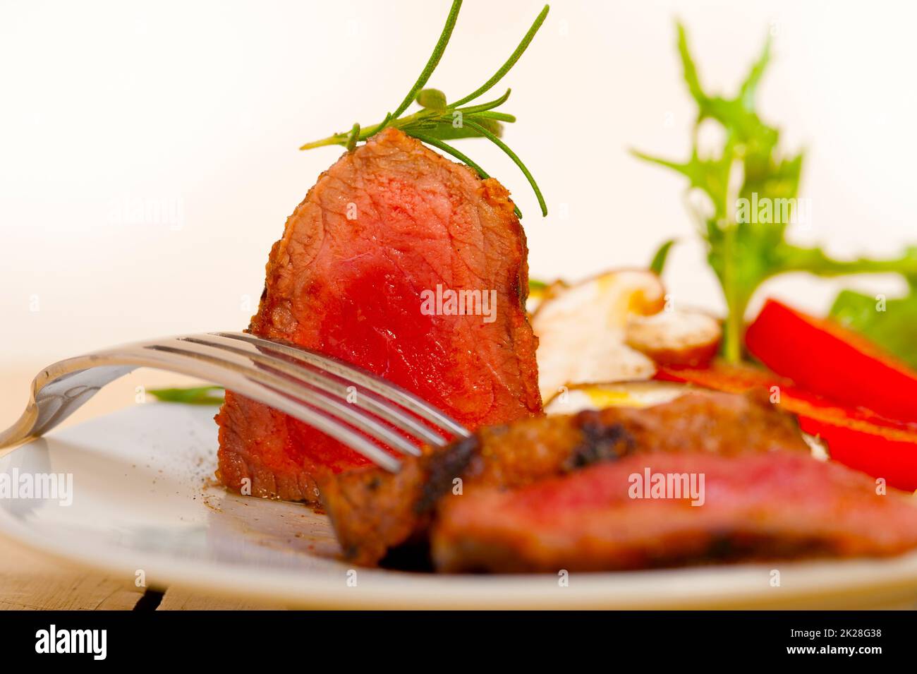 beef filet mignon grilled with vegetables Stock Photo - Alamy