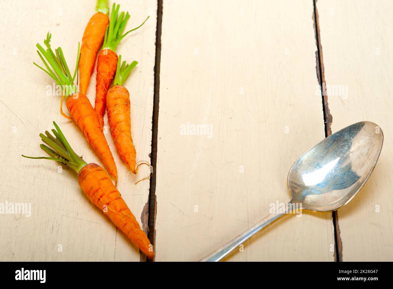 Baby carrots hi-res stock photography and images - Alamy