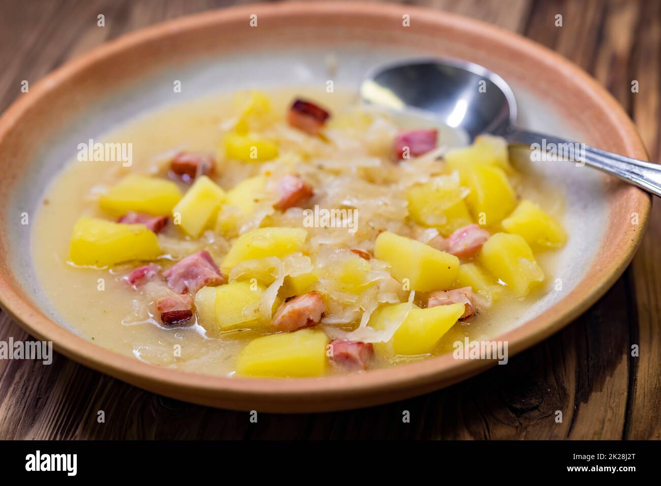 Czech traditional cabbage soup with smoked meat and potatoes Stock ...