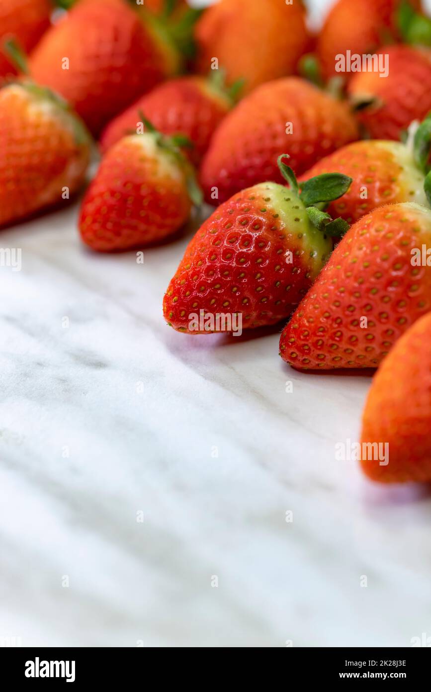 still life with strawberries on a white patterned background Stock ...