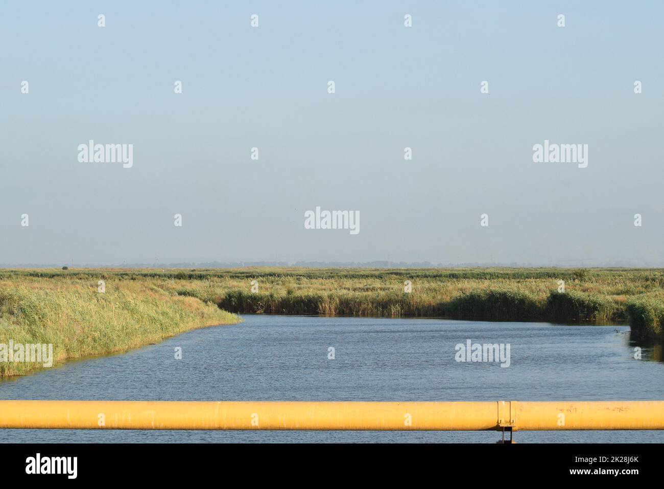 The gas pipeline through the small river Stock Photo - Alamy