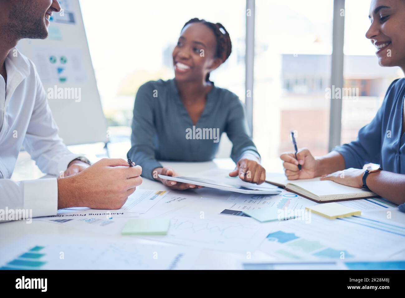 Business people, analytics and meeting discussion for documents, paperwork and research at the ...