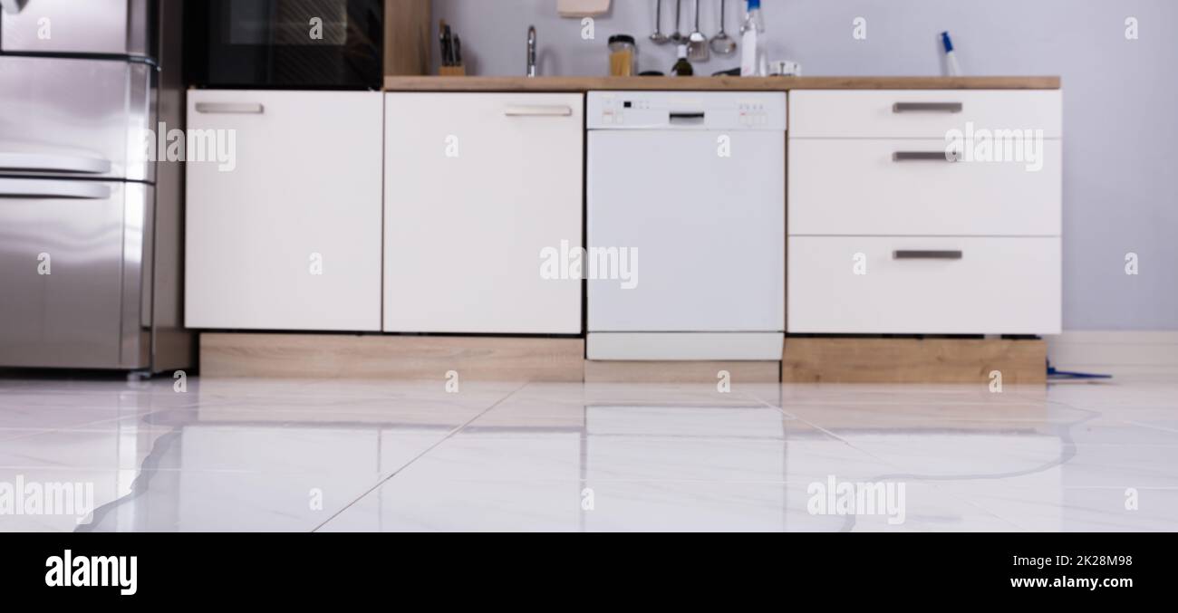 Tile Kitchen Floor Inside Home With Leak And Flood Stock Photo - Alamy