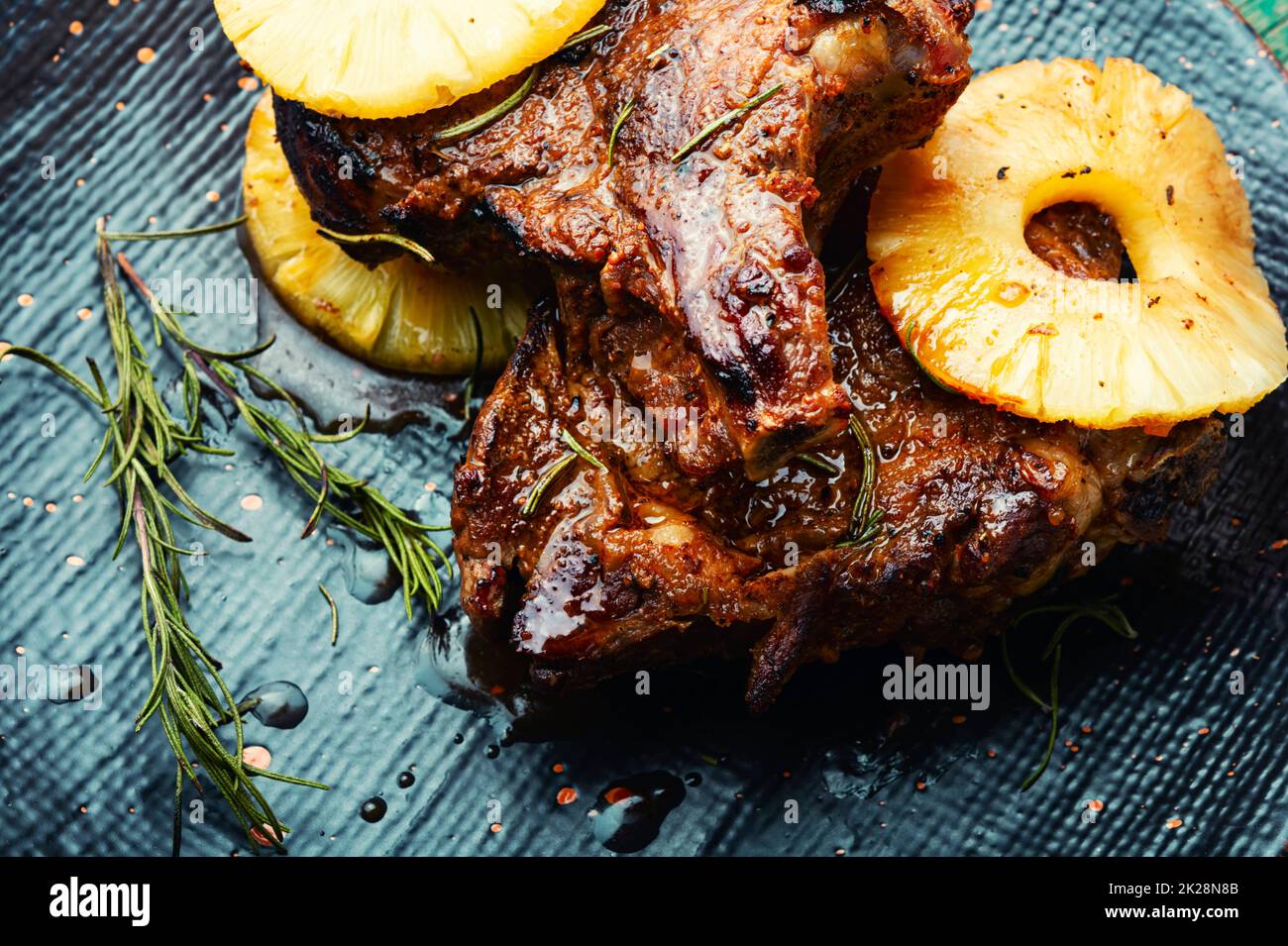 Meat barbecue with pineapple rings Stock Photo - Alamy