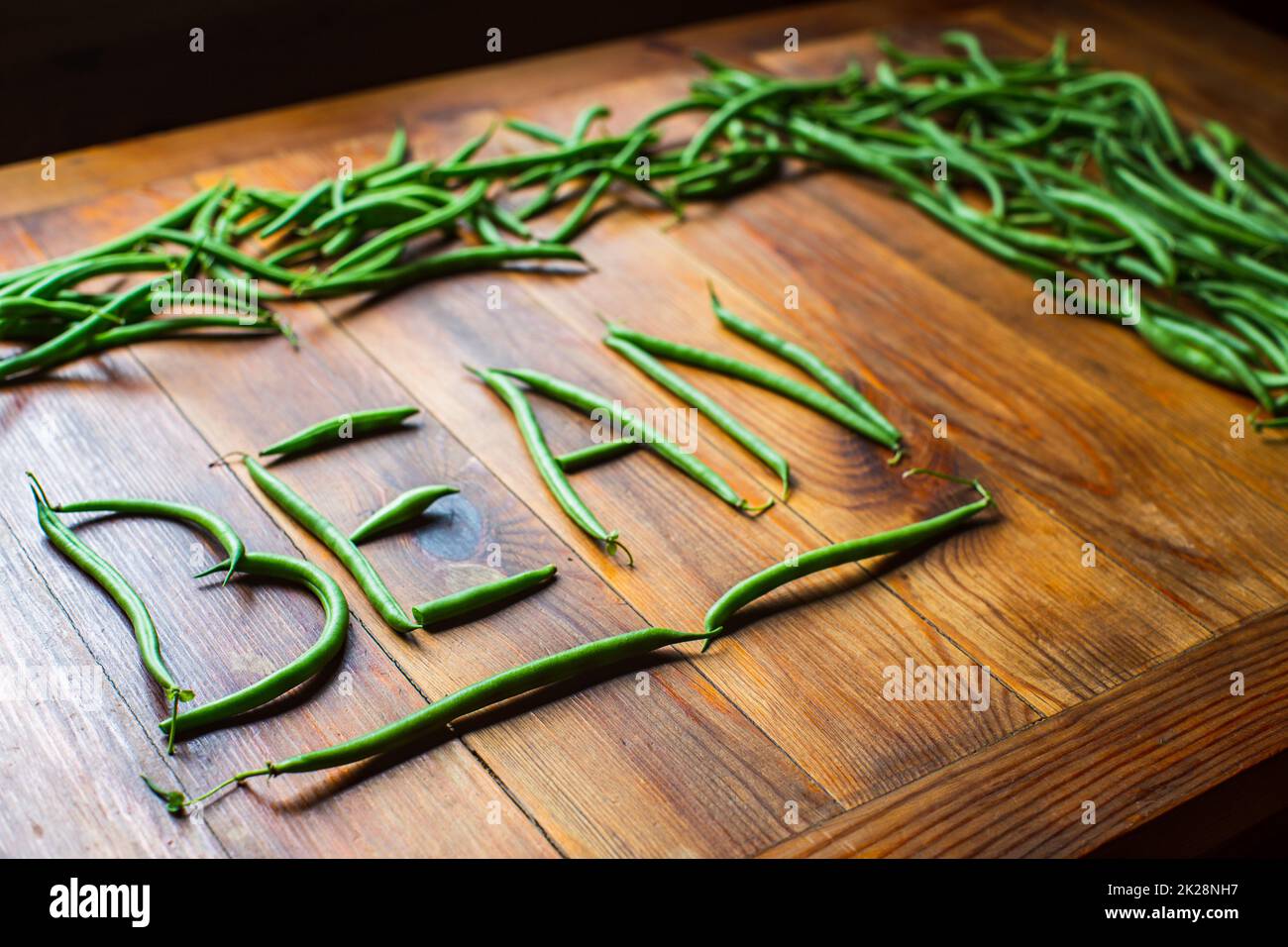 Person picking beans from plant hi-res stock photography and images - Alamy