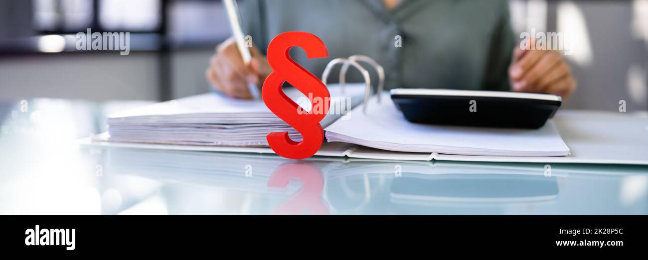 Red Paragraph And Calculator Stock Photo - Alamy