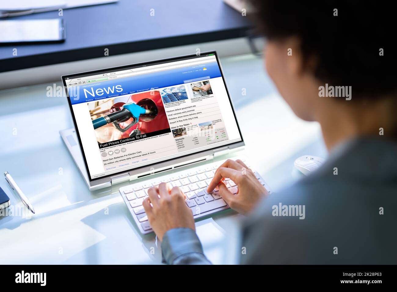 African american girl reading newspaper hi-res stock photography and ...