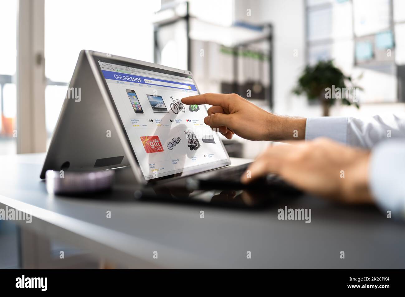 Ecommerce Shopping On Convertible Laptop Stock Photo - Alamy