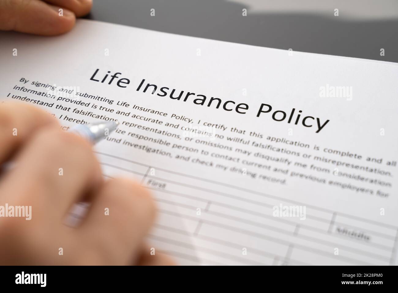 Person Hand Filling Life Insurance Policy Application Stock Photo - Alamy