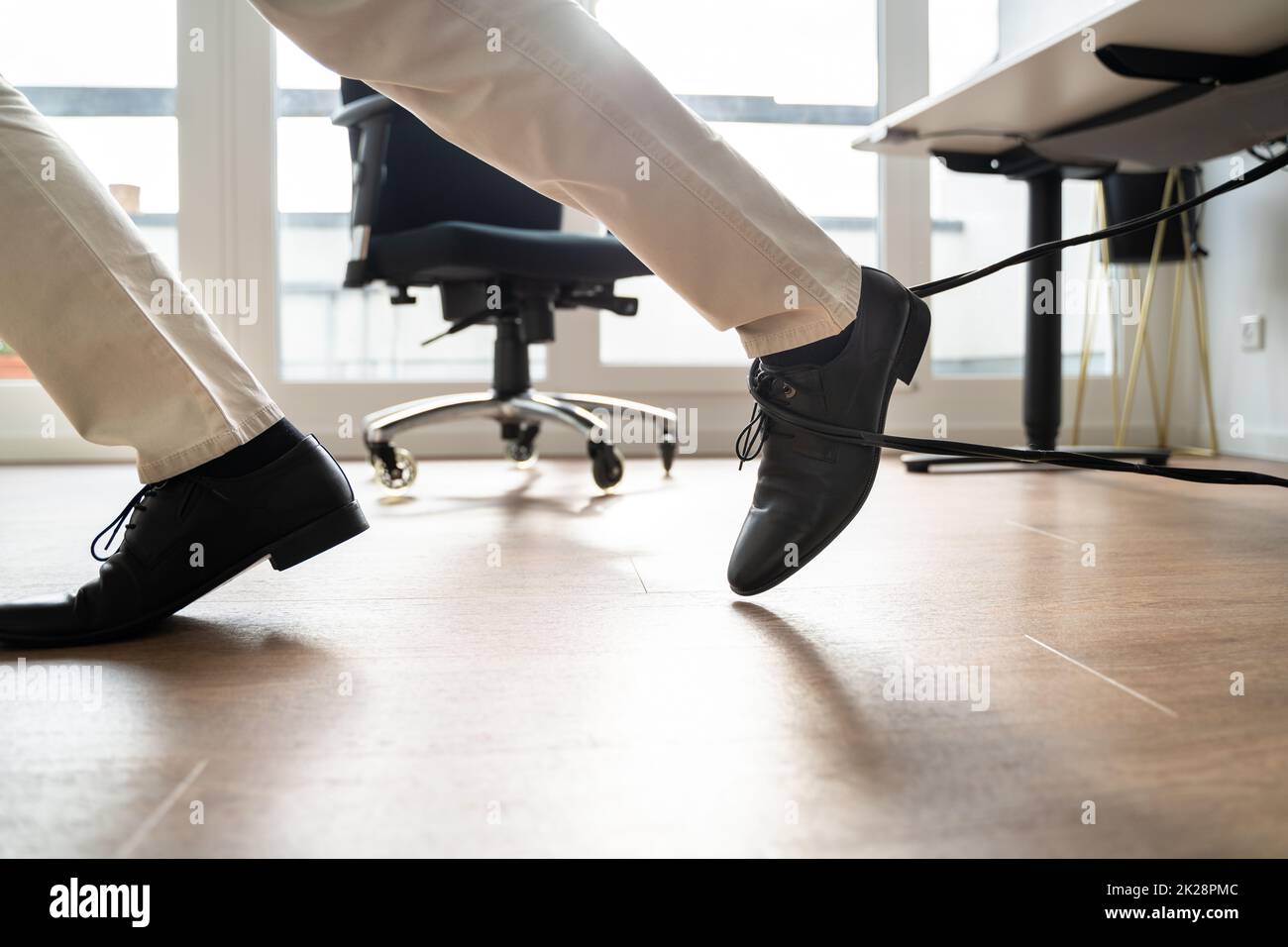 Stumble And Fall Over Wire Stock Photo - Alamy