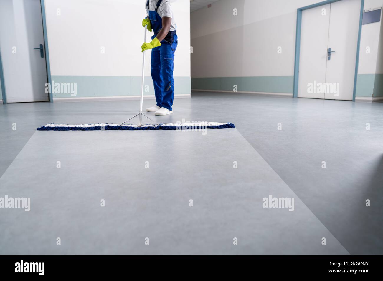 Young man cleaning working hi-res stock photography and images - Alamy