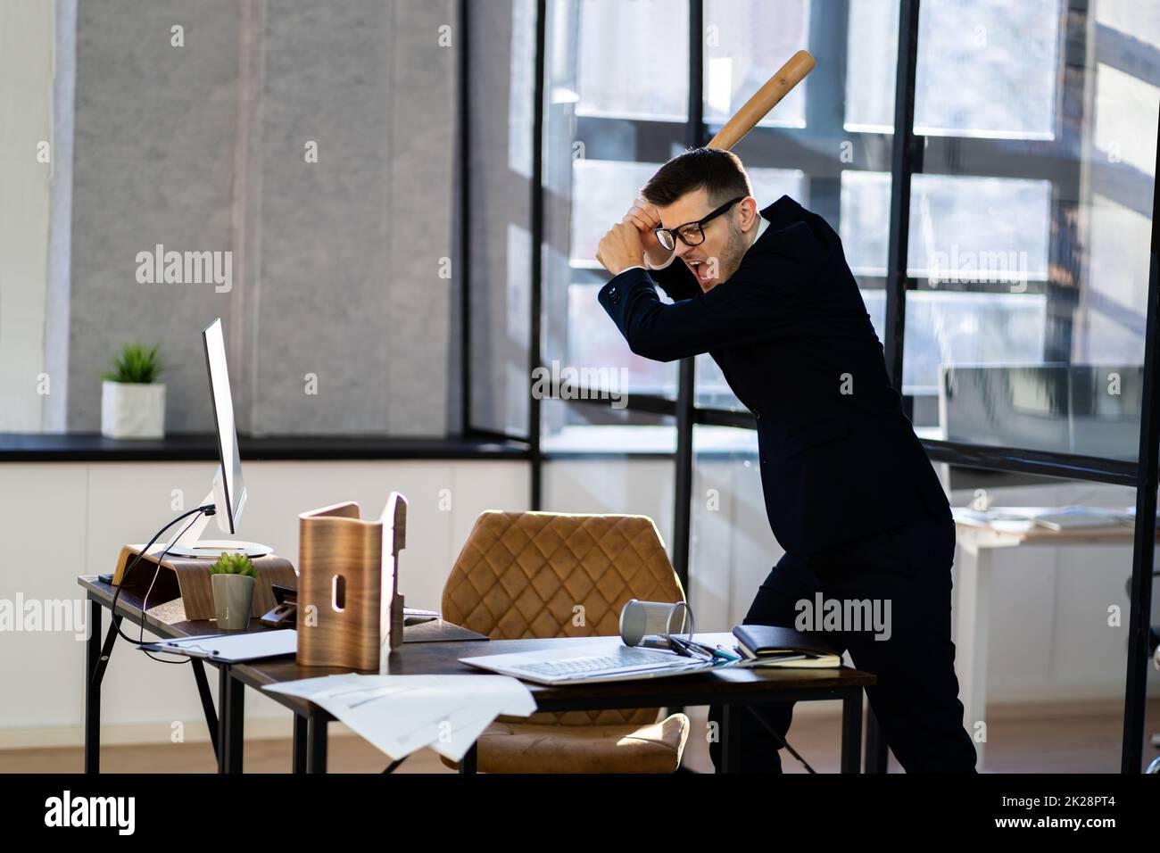 Sad Angry Business Manager In Office Stock Photo - Alamy