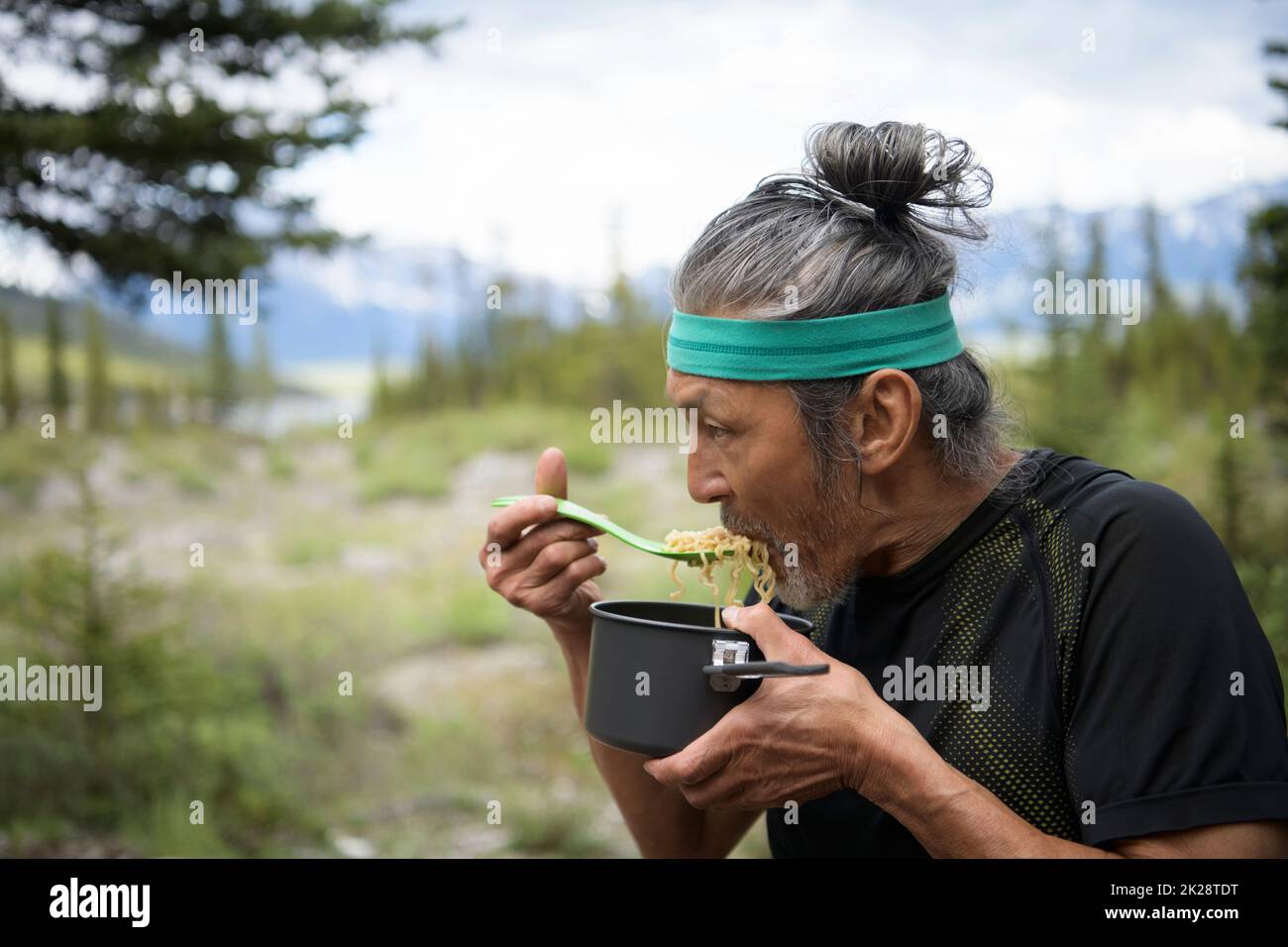 Man eating pot noodle hi-res stock photography and images - Alamy