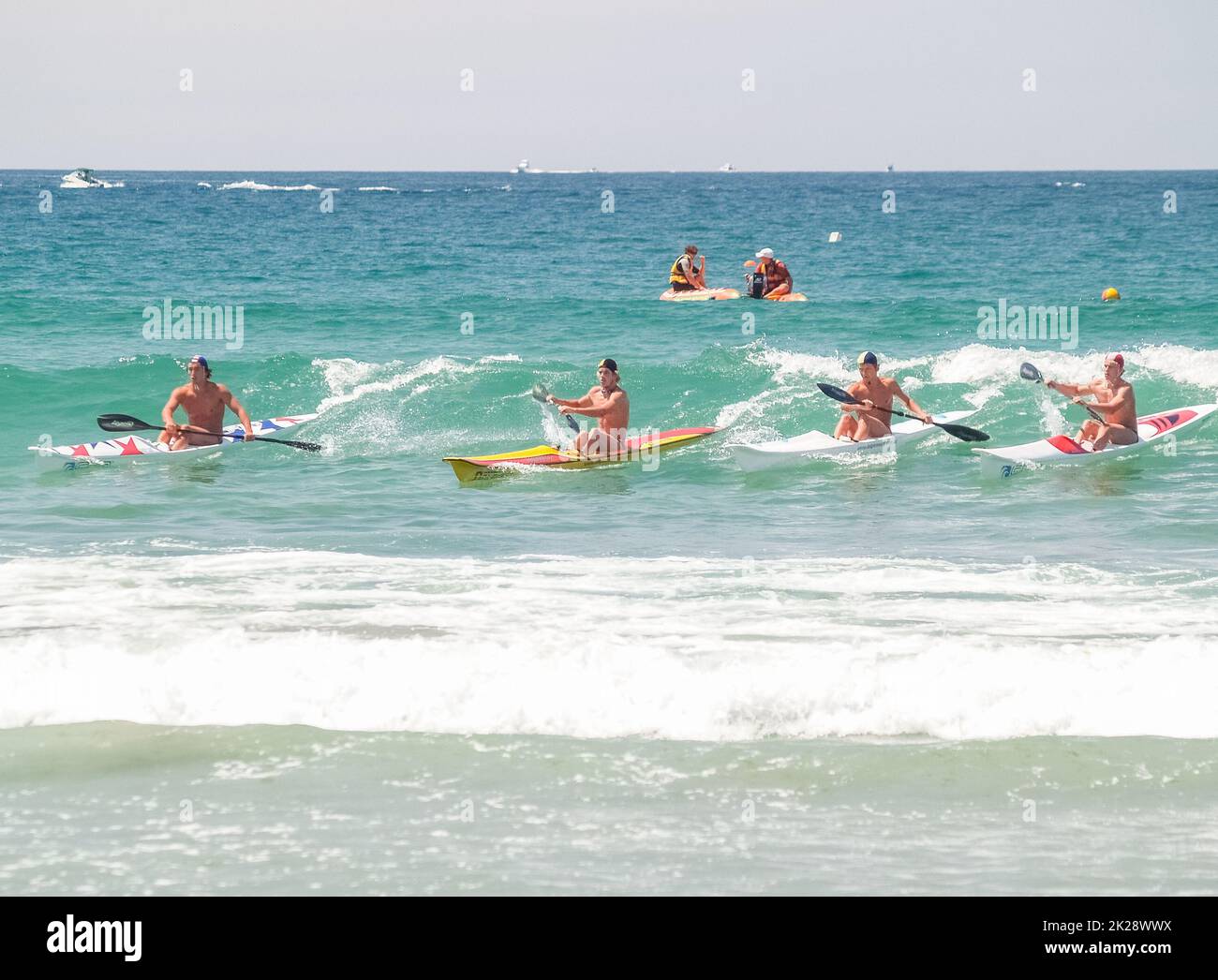 Tauranga New Zealand - January 25 2009; Paddlers on last wave to shore ...