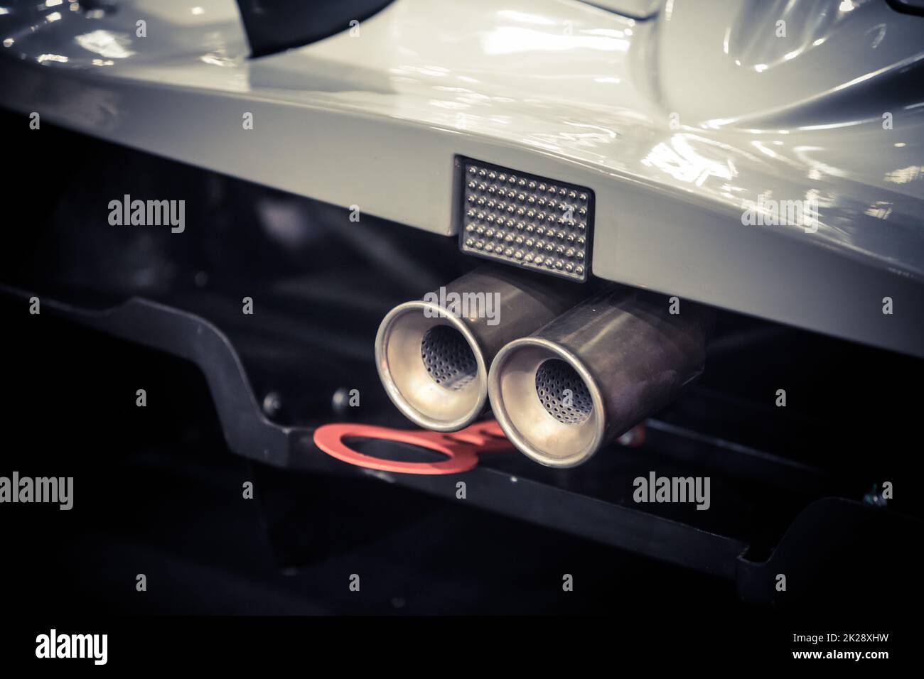 Rear exhaust pipe of a sports car Stock Photo - Alamy