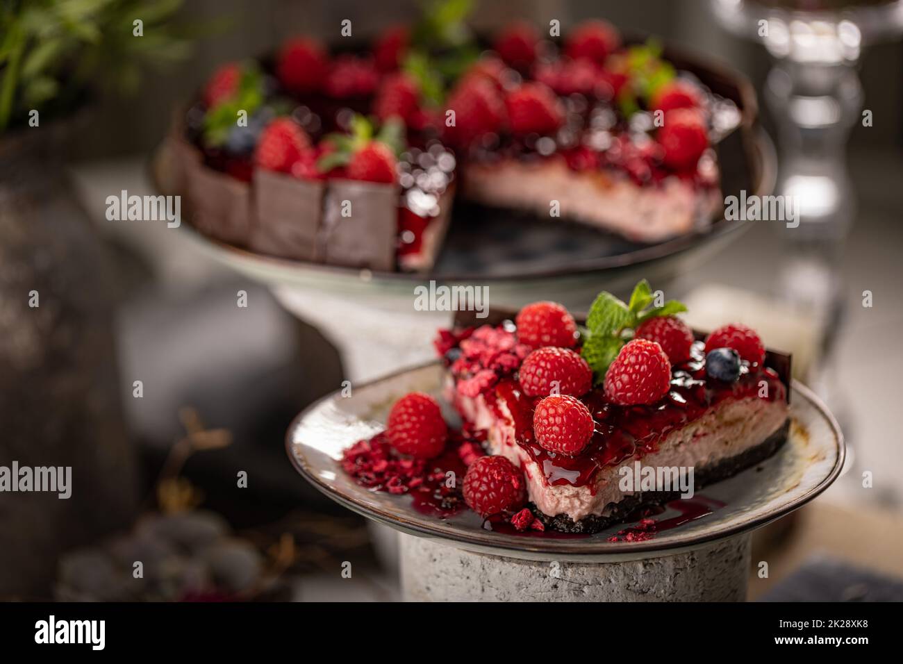 Cheeseckae with raspberry jelly topping Stock Photo - Alamy
