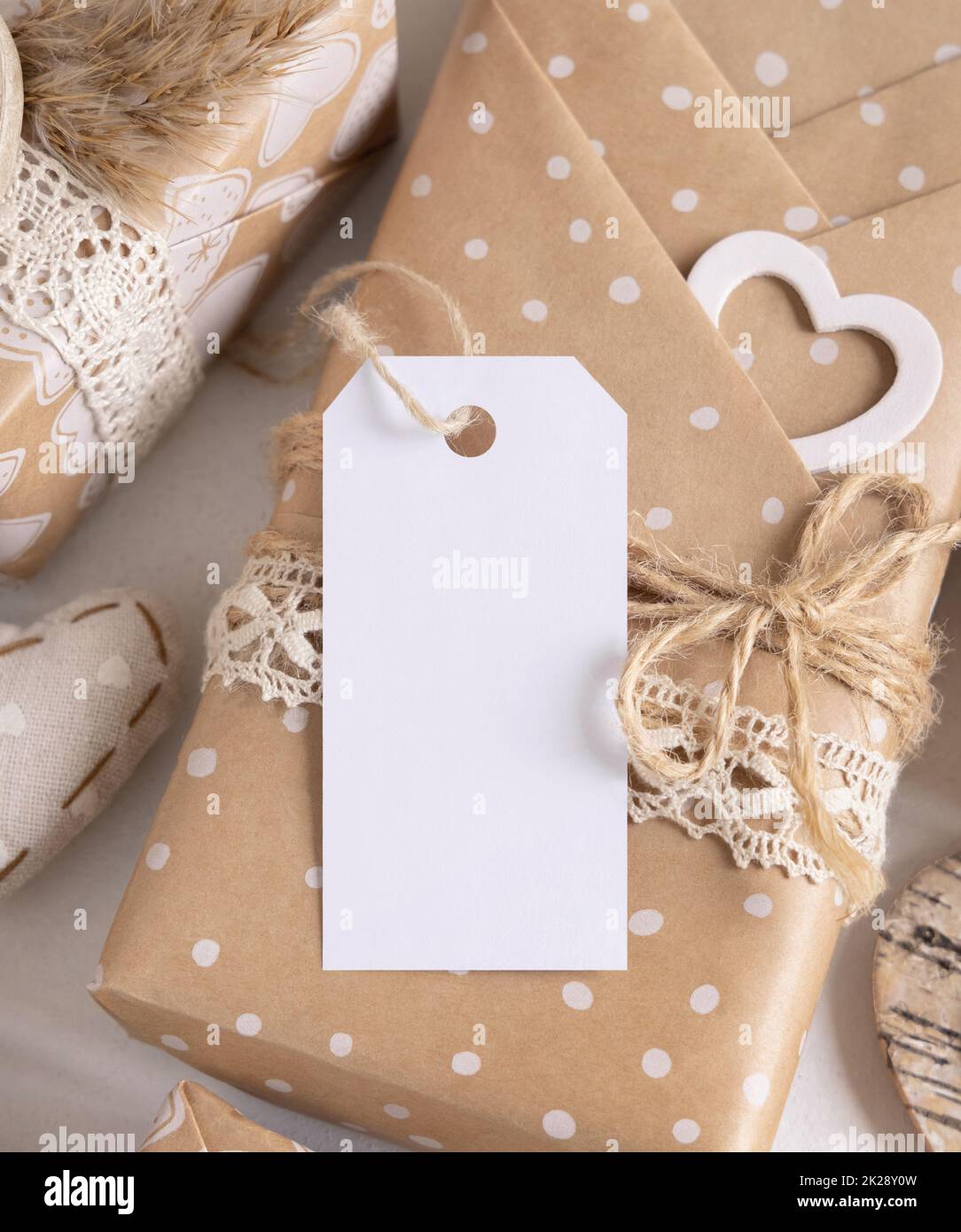 Valentines present with blank gift tag and hearts close up, Rustic ...