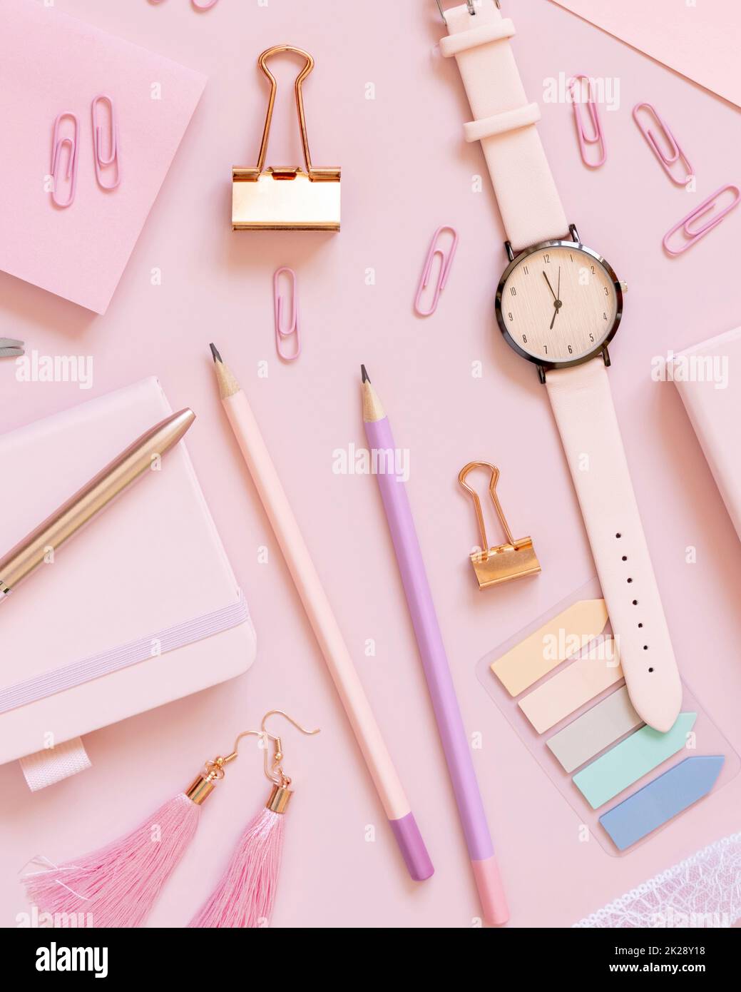 Pink school girly accessories and stationery on pastel pink background ...