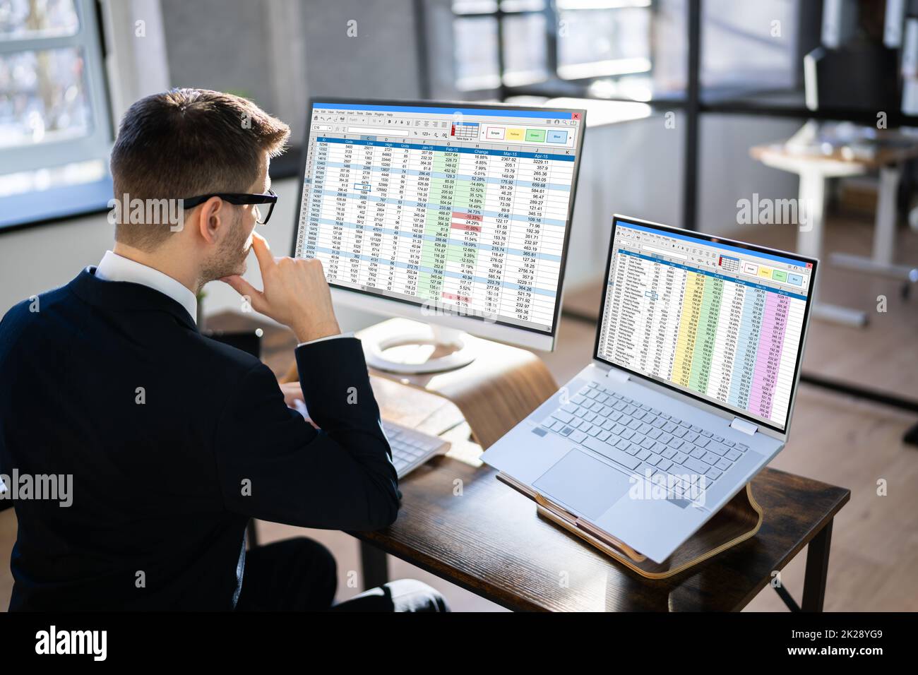 Analyst Working With Spreadsheet Business Data Stock Photo - Alamy