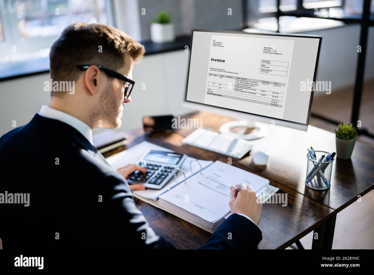 Young professional male accountant hi-res stock photography and images ...