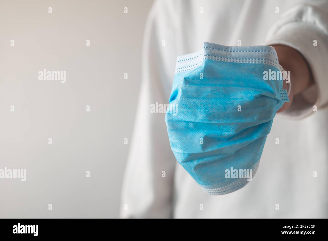 Medical mask in boxing gloves shape. Disease protection such as ...