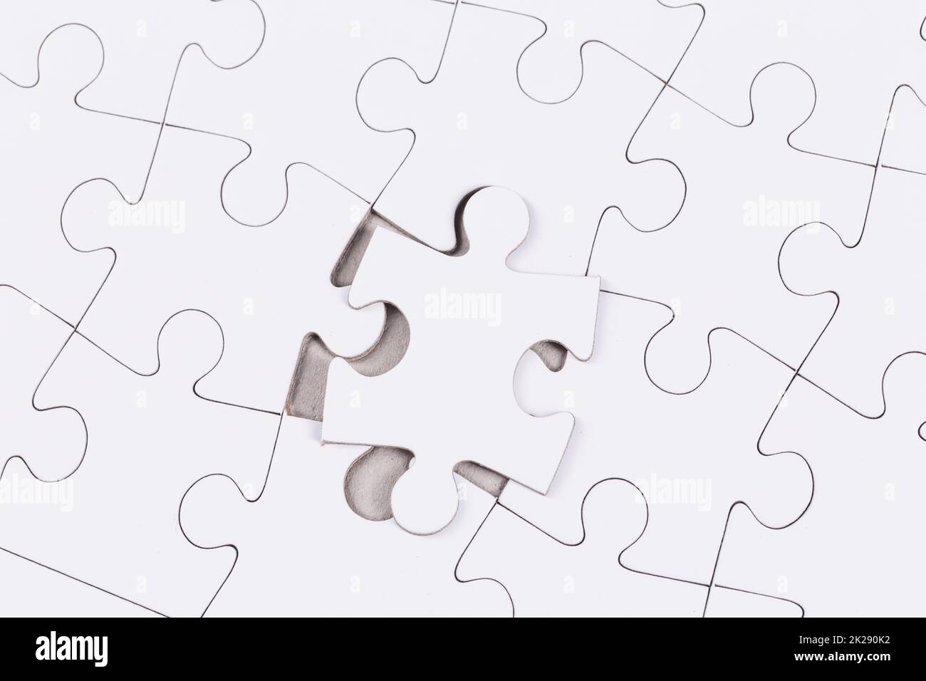 White jigsaw hi-res stock photography and images - Alamy