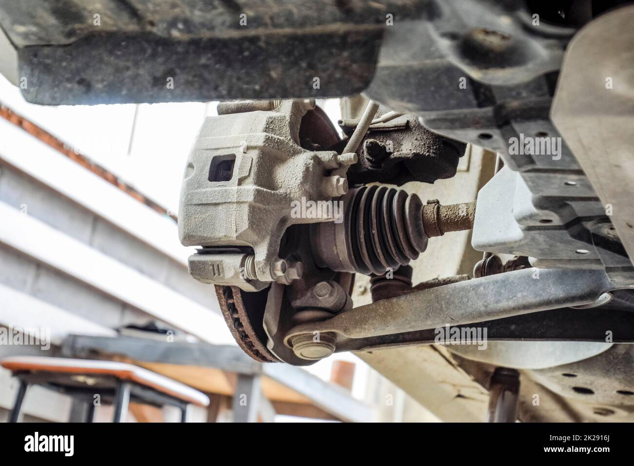 Forged car for a hundred. Car repair. Car view from below Stock Photo ...