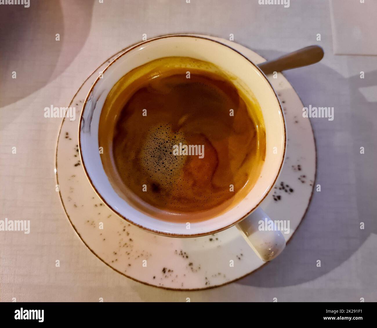 Selectuve focus view at a coffee surface in a white cup Stock Photo - Alamy