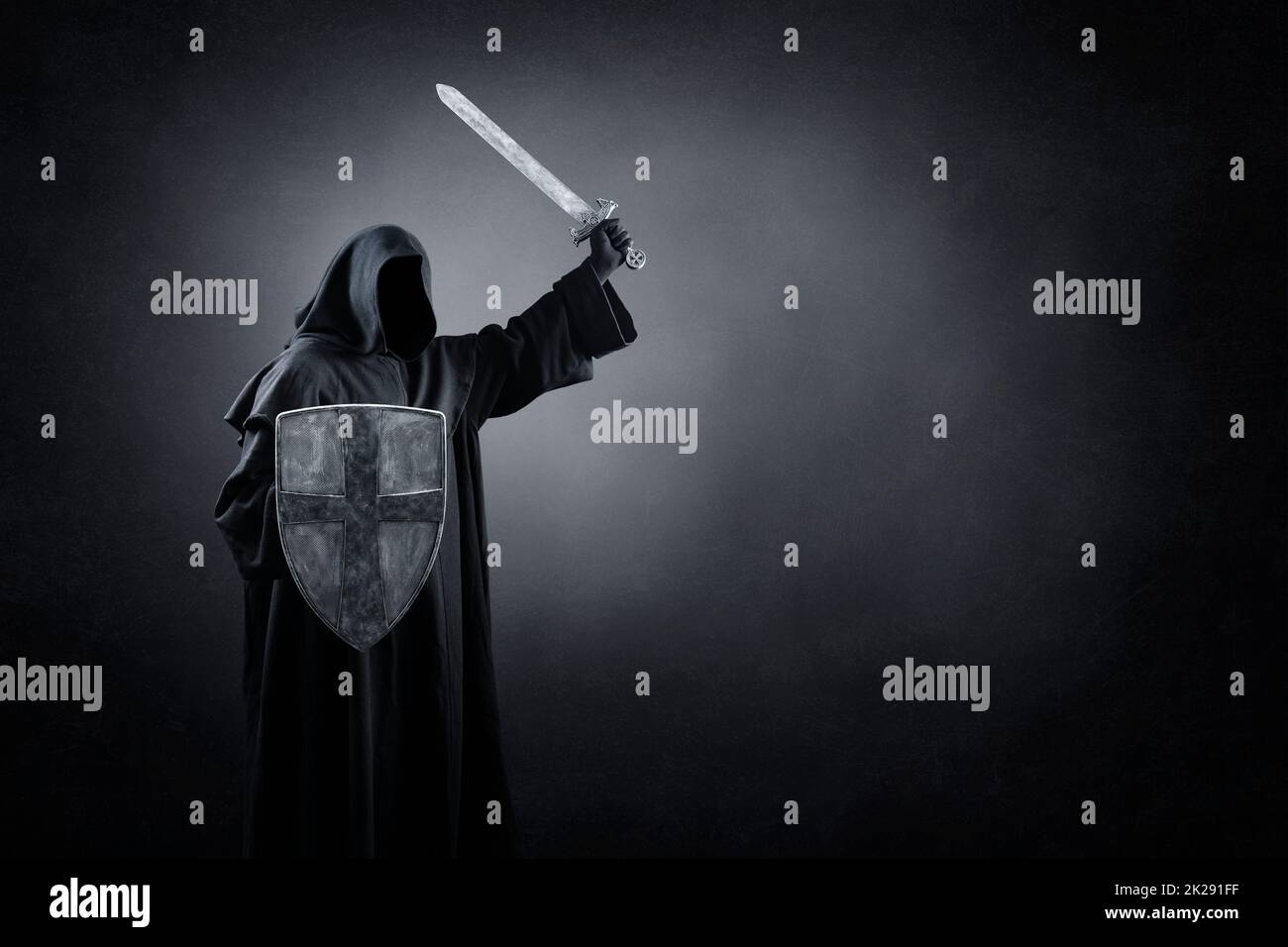 Dark knight with sword and shield in the darkness of the night Stock ...