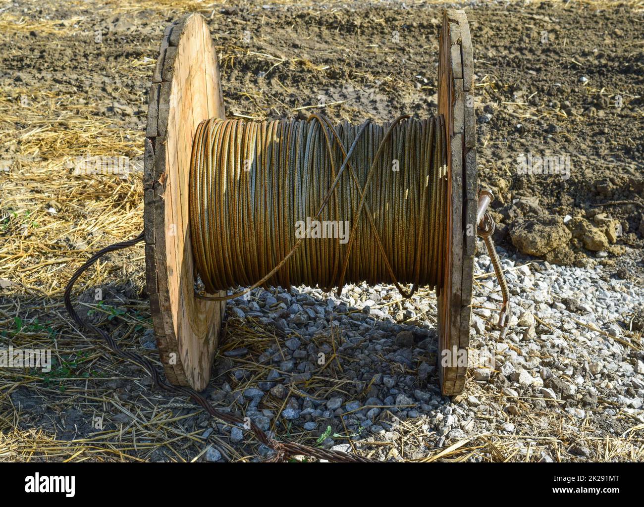 The unwinding of the high-voltage wire from the spool storage bay Stock ...