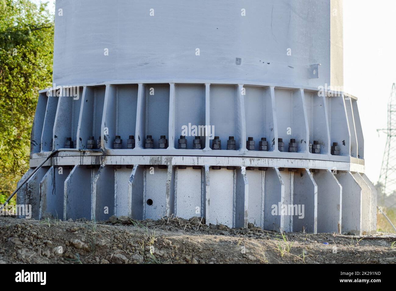 The base of the column power line support. Massive metal pole Stock ...