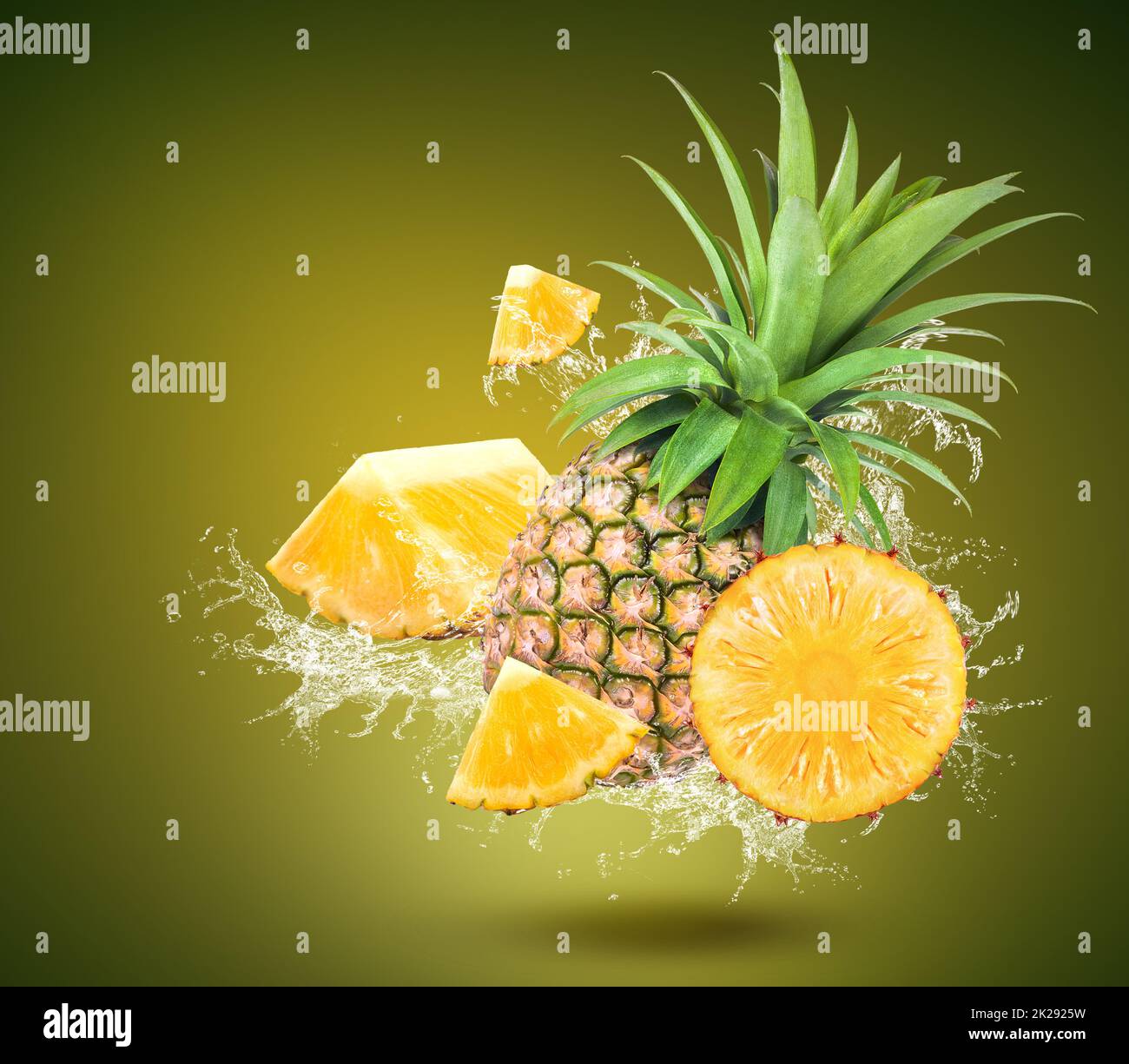 Water Splash On fresh pineapple With Leaves Isolated On Green ...