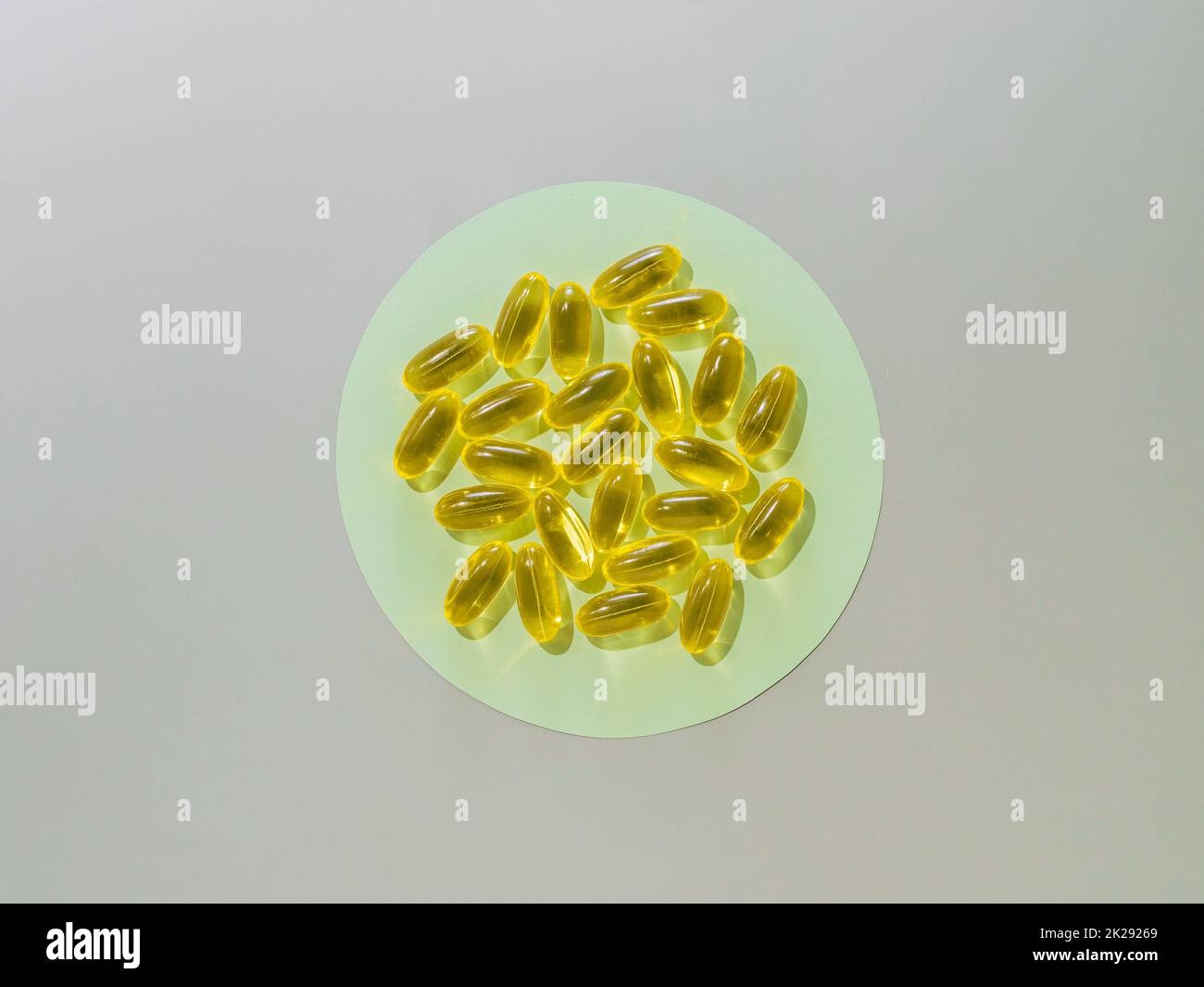 Vitamin D3 or Omega capsules, flat lay Stock Photo - Alamy