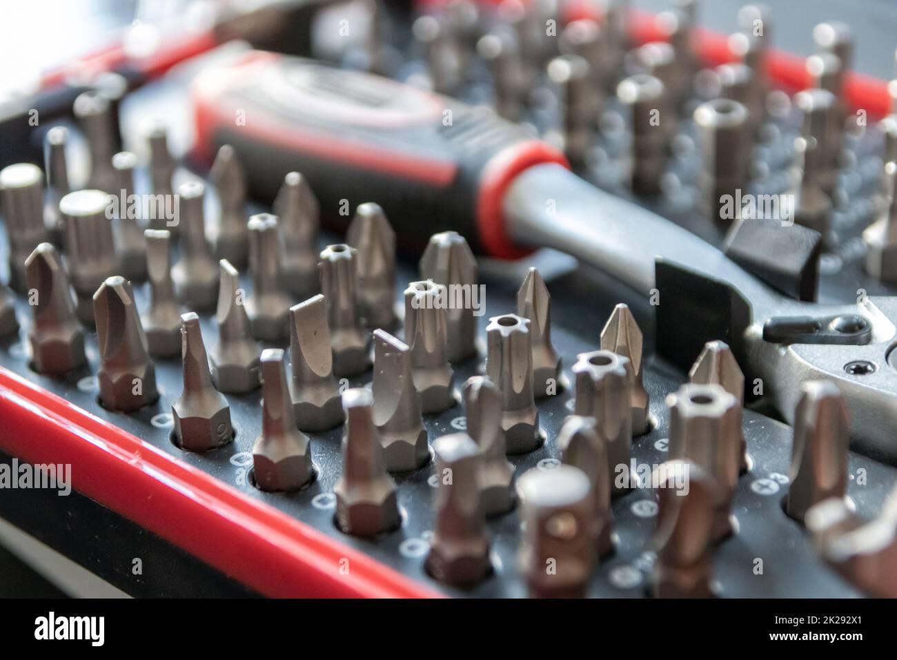 Screwdriver bits in toolbox as assorted screwing toolkit organizer with ...