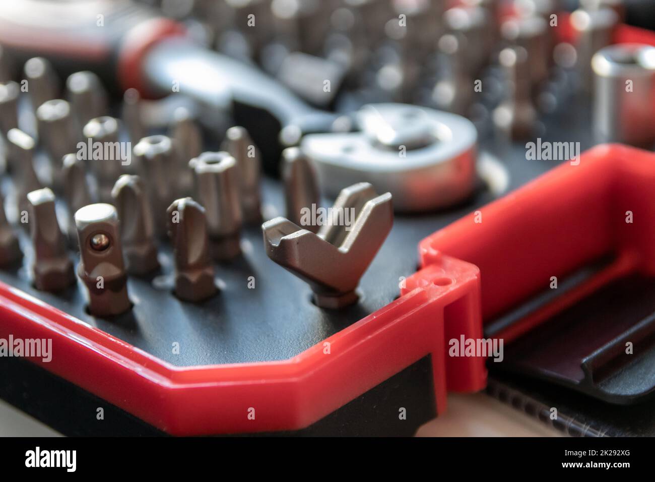 Screwdriver bits in toolbox as assorted screwing toolkit organizer with ...