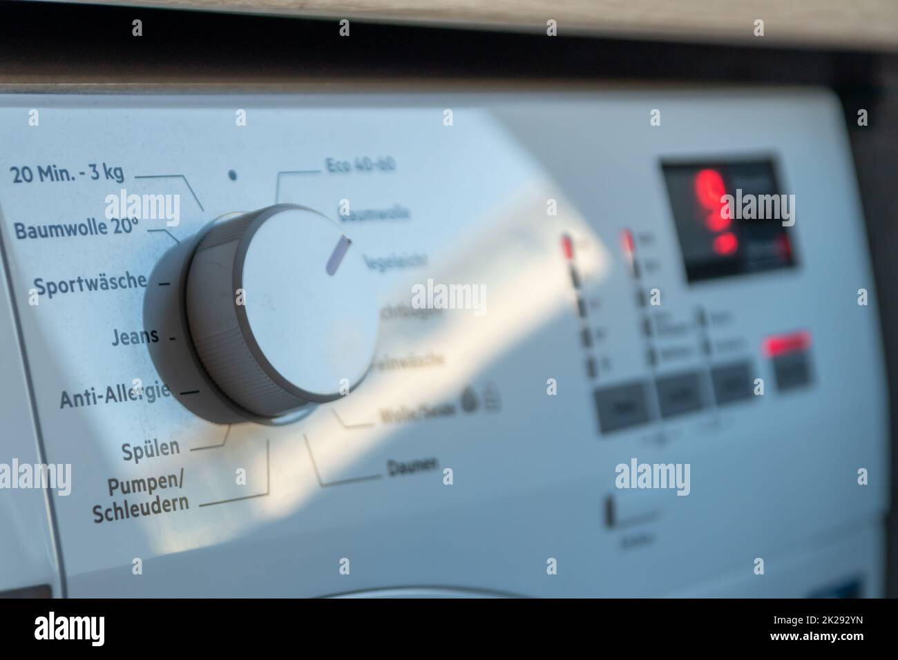 Detail view of washing machine control panel with contemporary ...