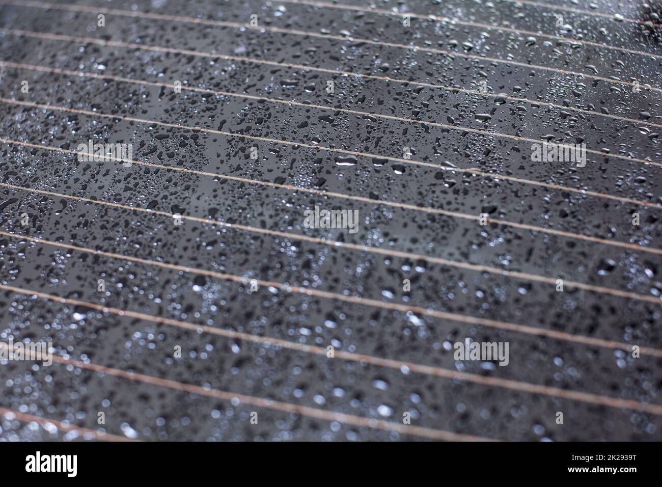 Drops of water on rear car window, heating stripes visible Stock Photo ...