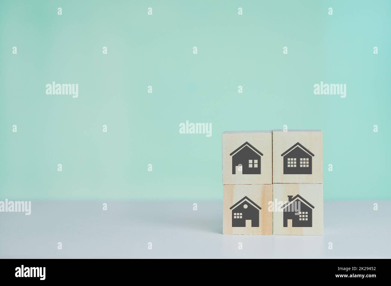 Wooden cubes with selling and renting houses or real estate concept ...