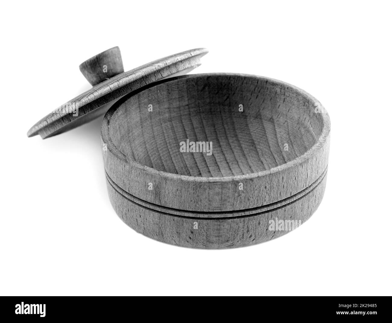 Empty wooden bowl with a lid isolated on white background. View from ...