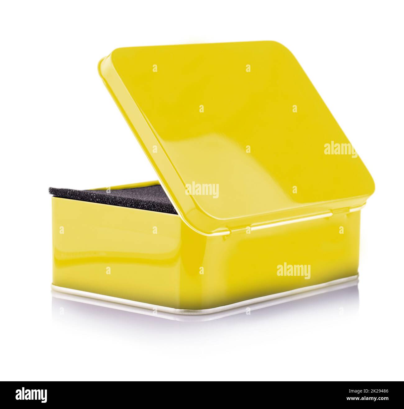 Closed Empty yellow metal box close-up isolated on white background ...