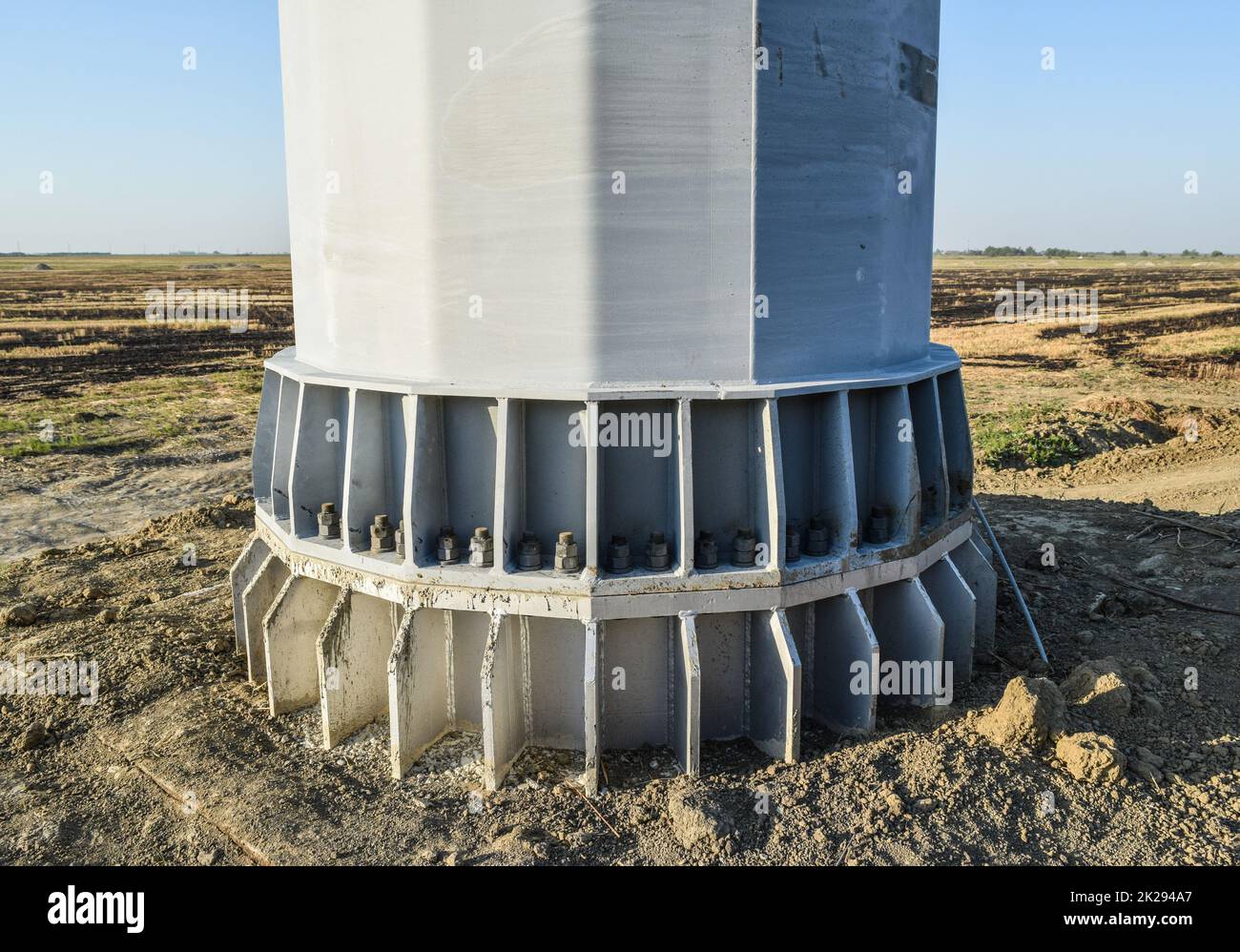 The base of the column power line support. Massive metal pole Stock ...